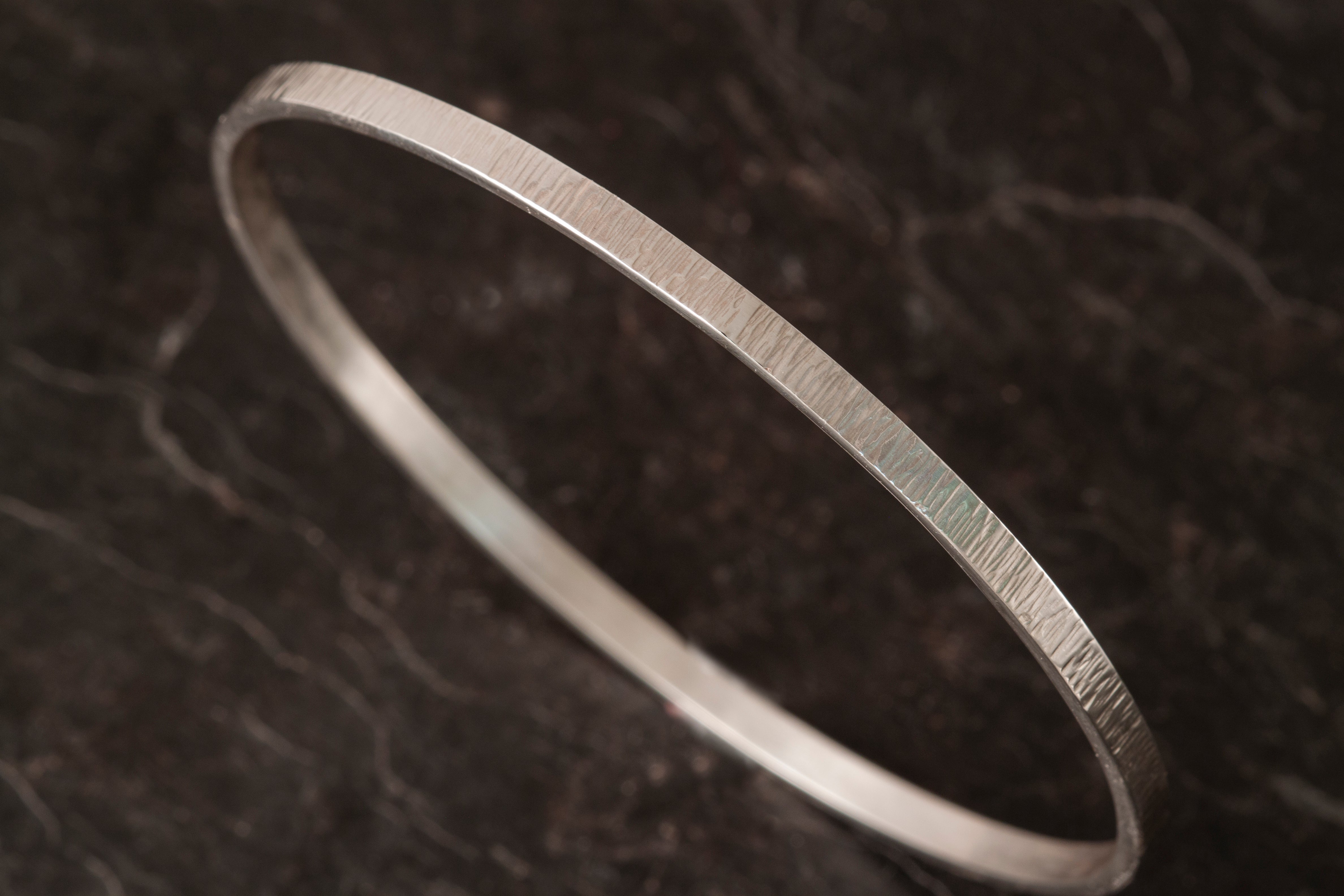 Flat textured bangle – Shetland Jewellery